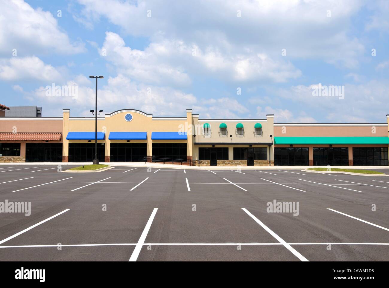Store Fronts in a New Shopping Center Stock Photo - Alamy