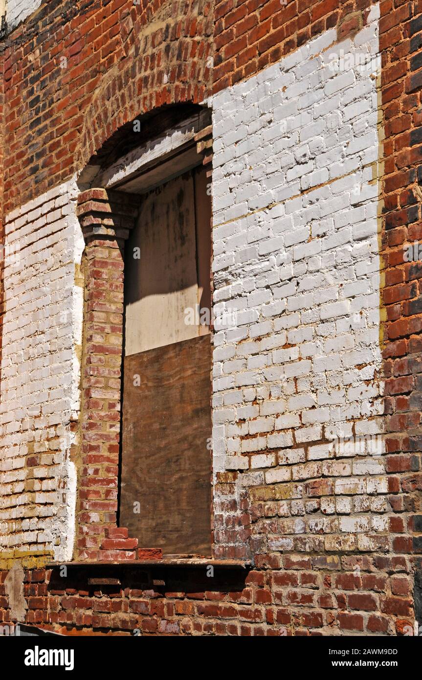 Boarded Up Doorway in Backstreet Alley Stock Photo - Alamy