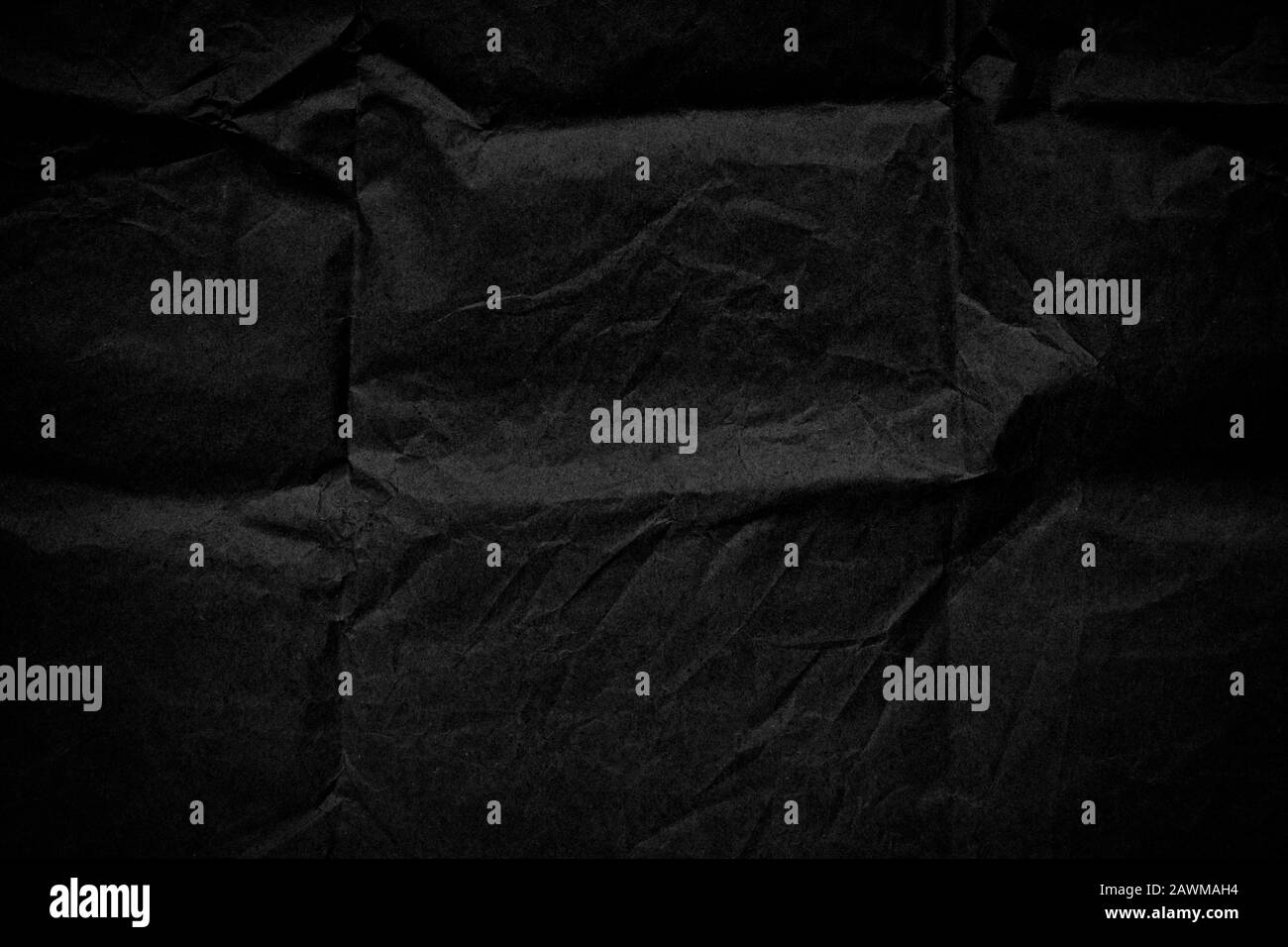 Black texture crumpled embossed paper background Stock Photo - Alamy