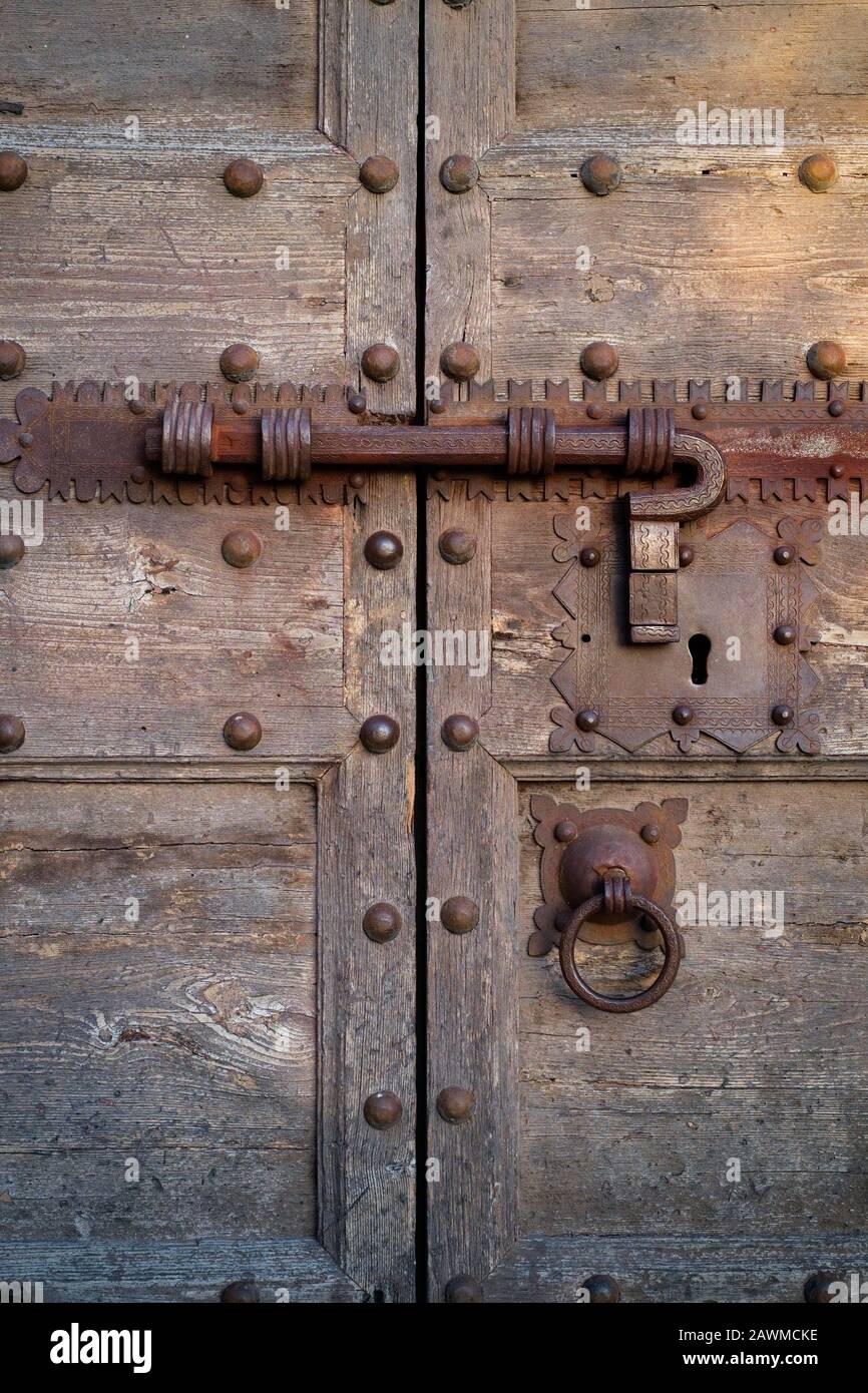 Detail of an ancient door with metal lock Stock Photo - Alamy