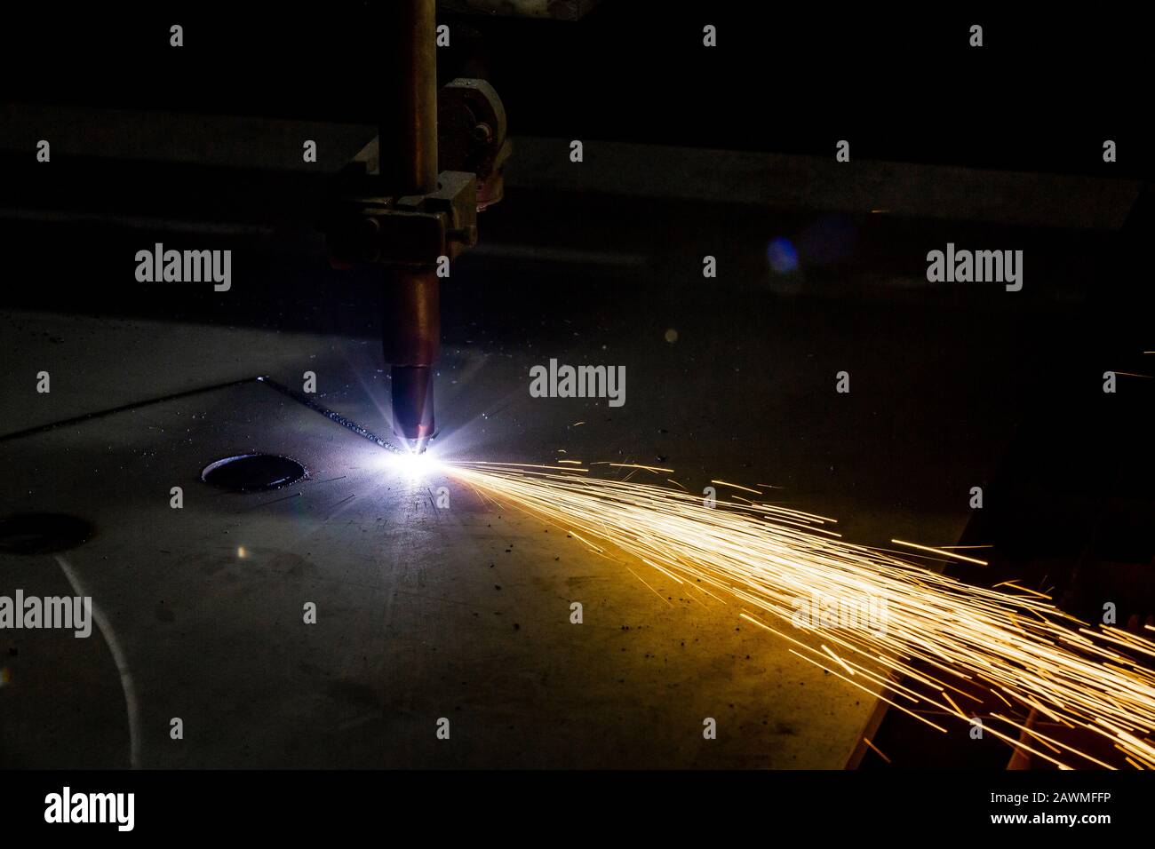 Plasma cutting of metal with a cnc. Plasma cutting machine cutting ...