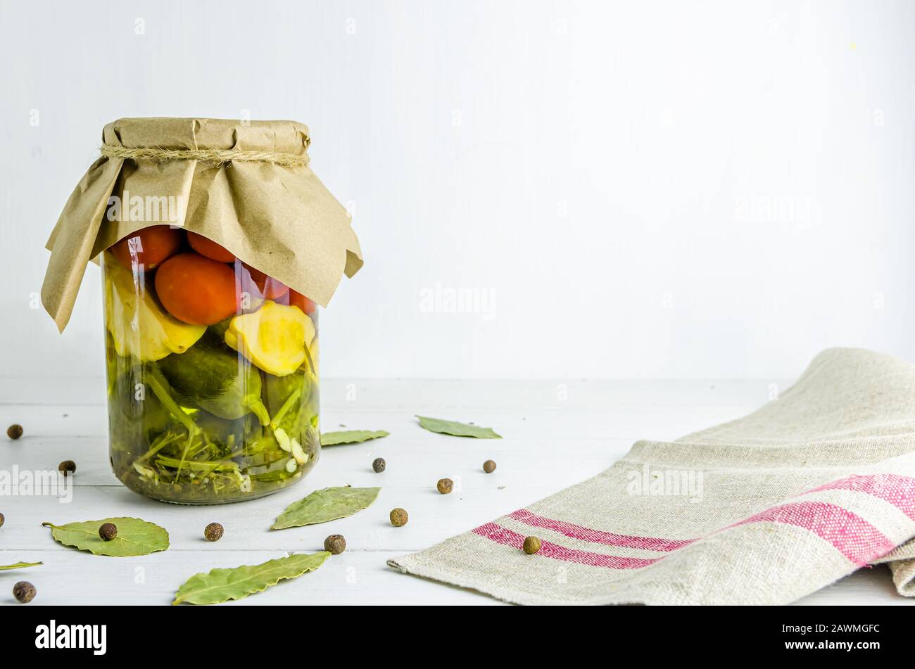 pickled vegetables. cucumbers, tomatoes, patissons on white background ...