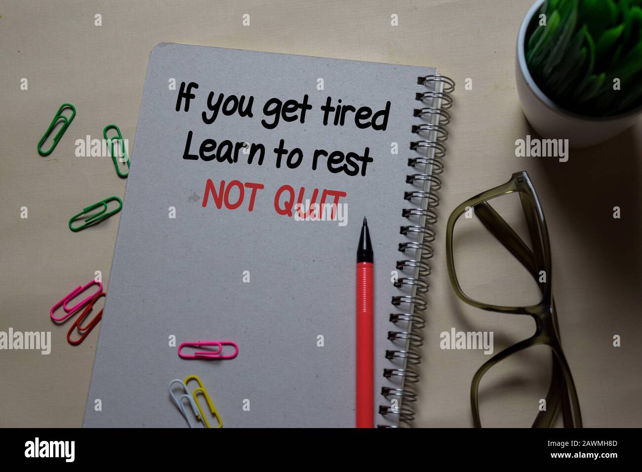 If you get tired. Learn to rest NOT QUIT write on a book isolated on ...