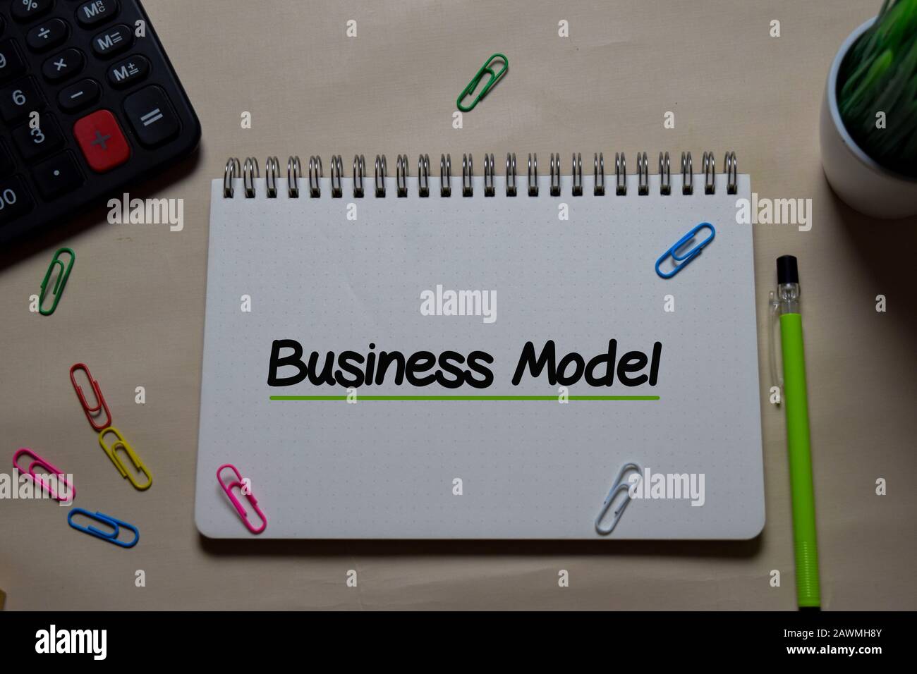 Business Model write on a book isolated on Office Desk Stock Photo - Alamy