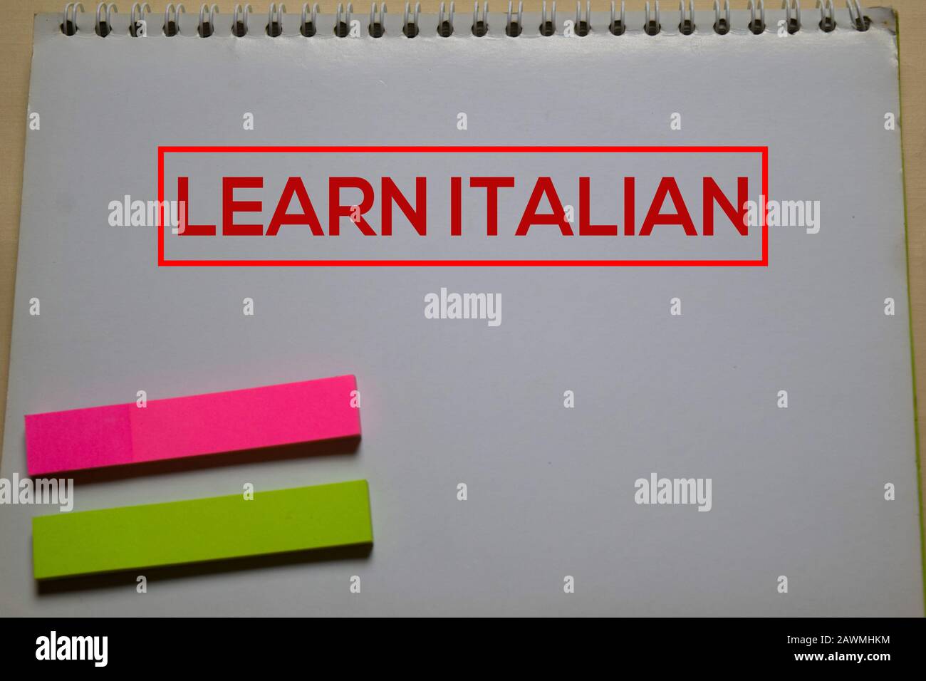 Learn Italian write on a book isolated on Office Desk Stock Photo - Alamy