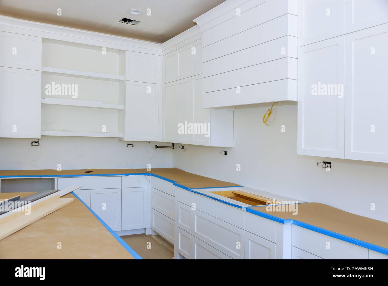 Installing new induction hob in modern kitchen kitchen Installation of ...