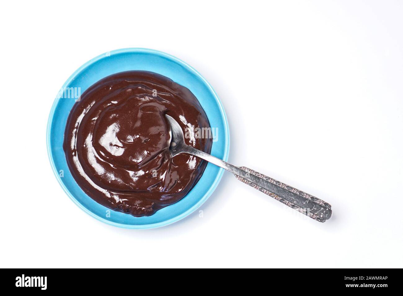 Chocolate pudding in a blue bowl Stock Photo - Alamy