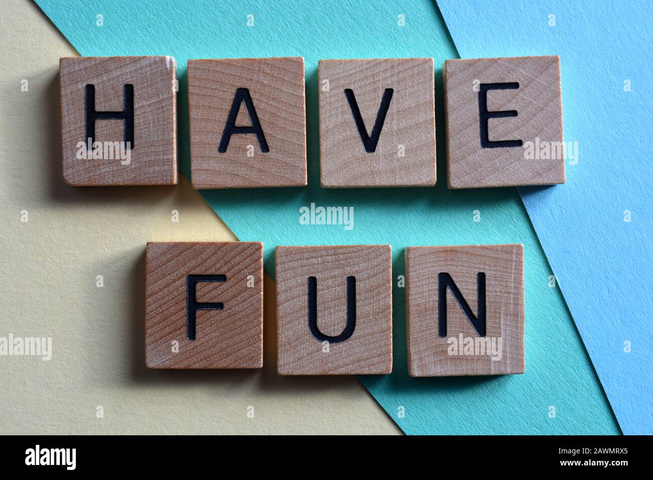 Have Fun, words in 3d wooden alphabet letters Stock Photo - Alamy