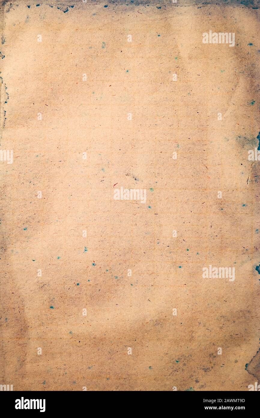 Aging, worn yellow paper with water stains and rough edges Stock Photo ...