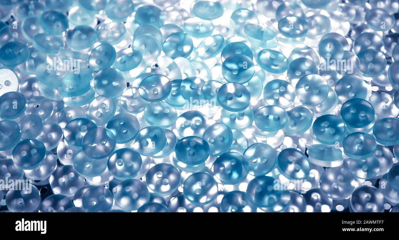 blue pearl plastic buttons background Stock Photo - Alamy