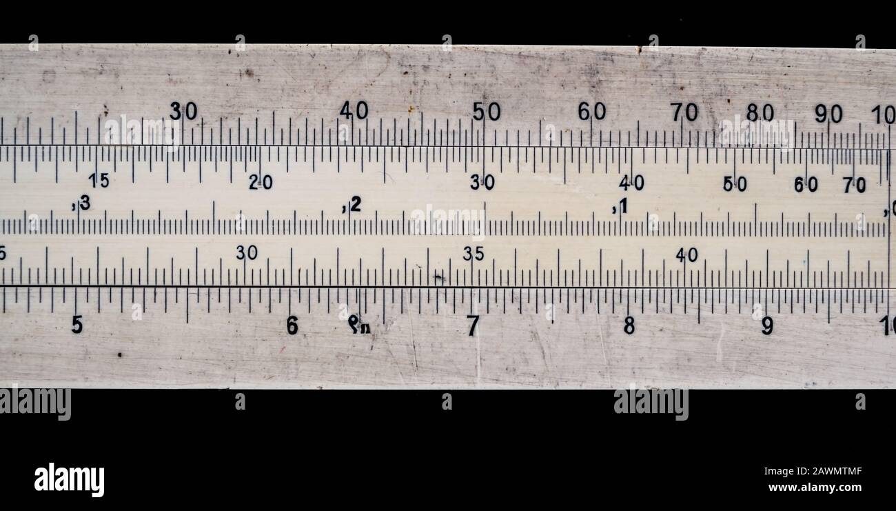 Old pocket slide rule mechanical calculator Stock Photo - Alamy