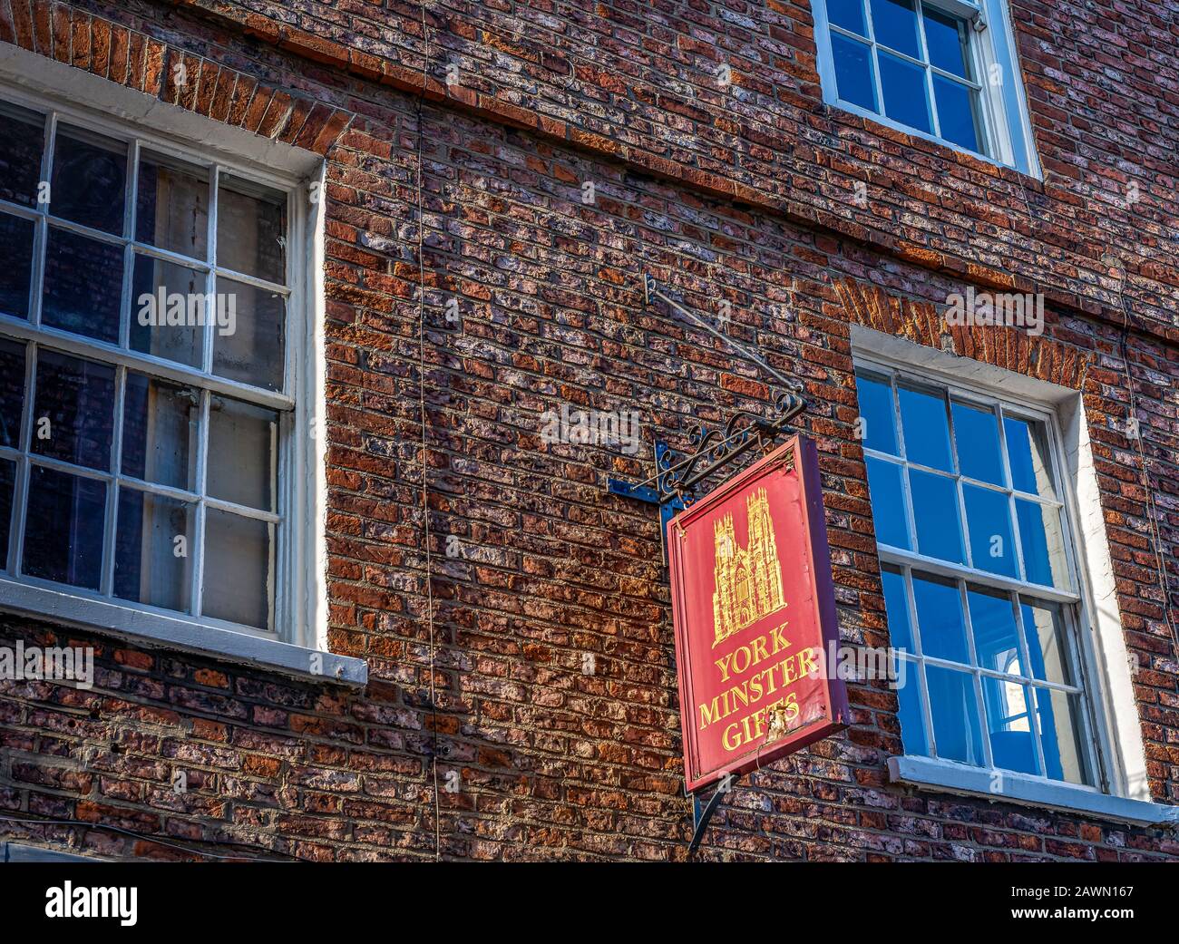 The upper storey of a brick building over a shop near York Minster. A ...