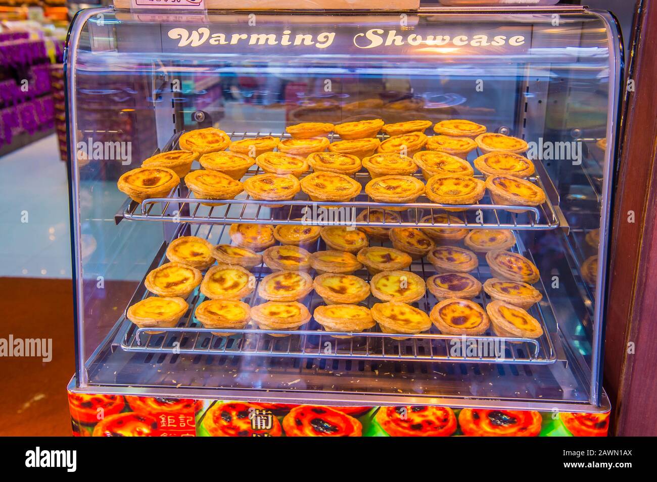 Macau style egg tart in a bakery shop in Macau Stock Photo - Alamy