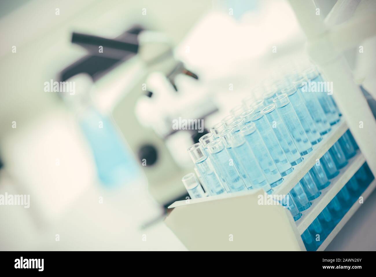 close up. tubes of blue liquid in the science lab Stock Photo - Alamy