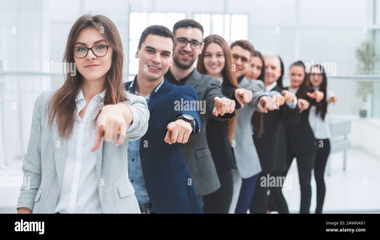 Group happy business people pointing hi-res stock photography and ...