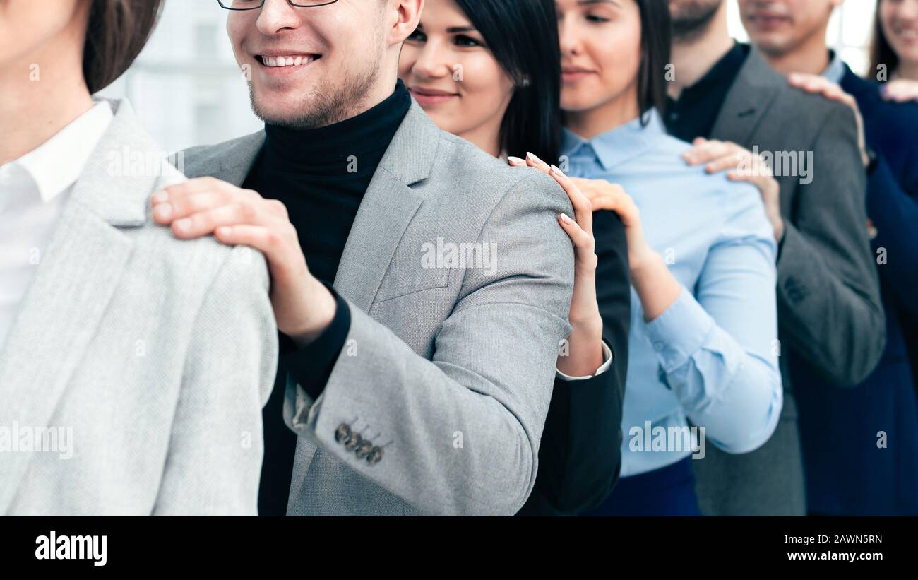 group of young business people standing behind each other Stock Photo ...