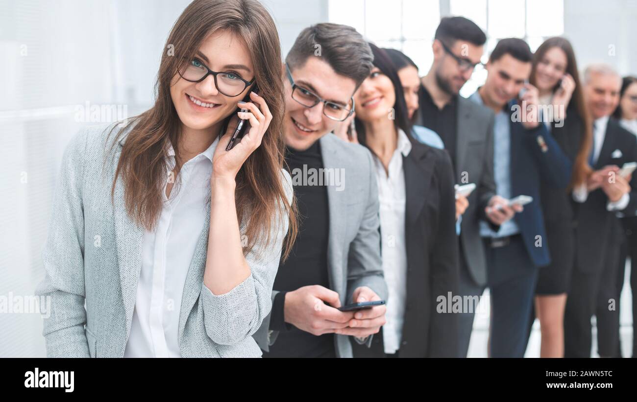group of diverse young people use their smartphones Stock Photo - Alamy