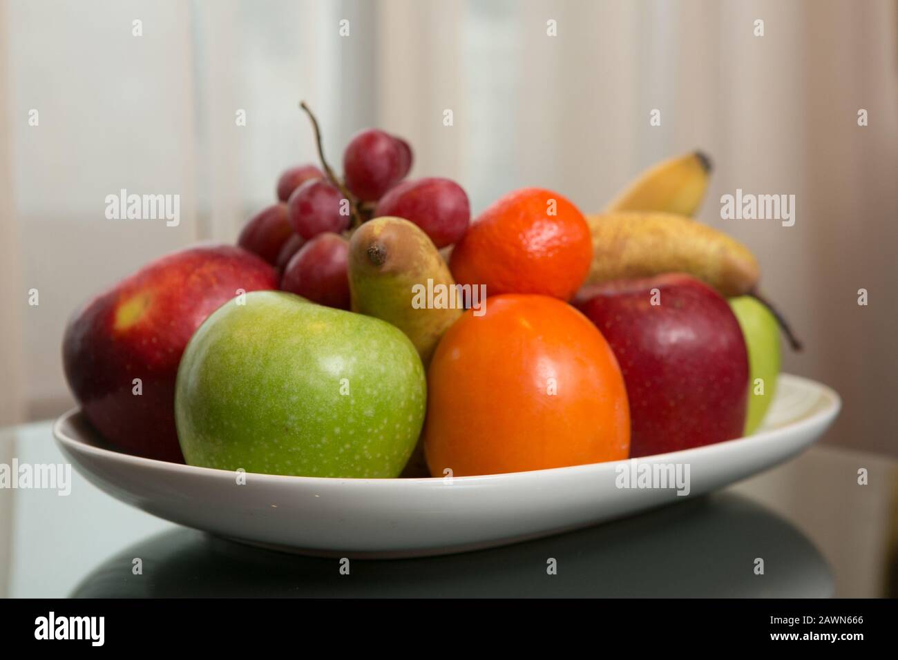 Mixed fruit platter on the table. Shallow dof Stock Photo - Alamy