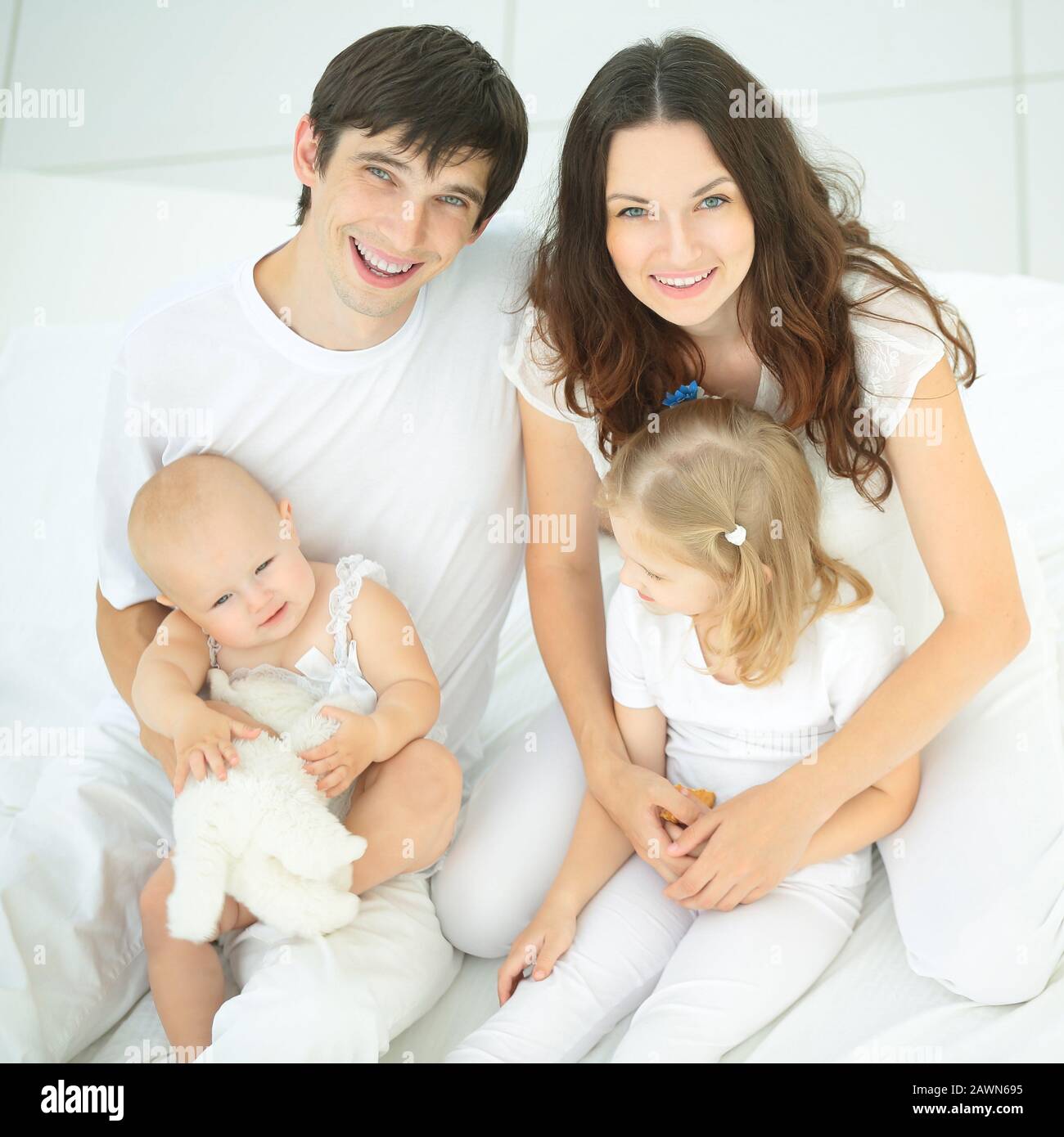portrait of a happy family on a white background Stock Photo - Alamy