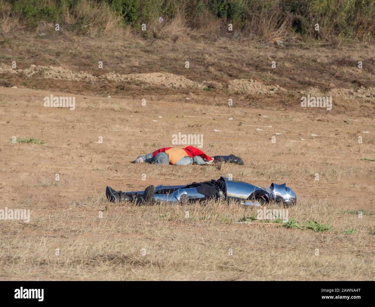 Killed medieval soldiers lying in a battlefield Stock Photo - Alamy