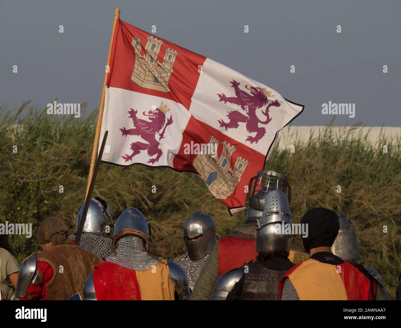 Group of Spanish medieval knights holding Spanish royal flag Stock ...