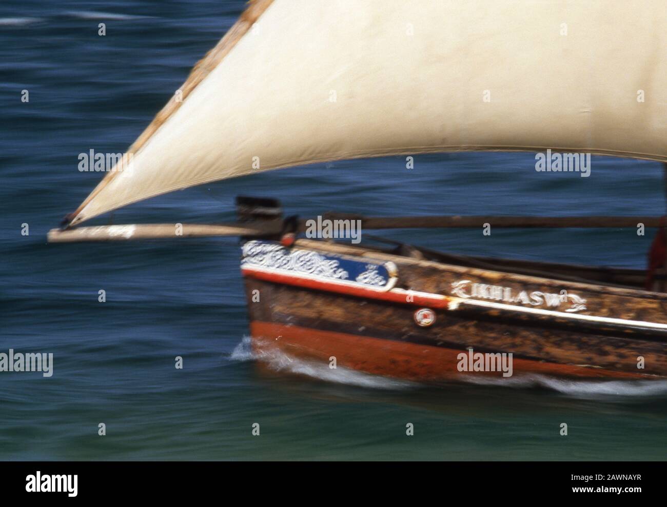 Sailing dhow with lateen sail, island of Lamu off the Indian Ocean ...