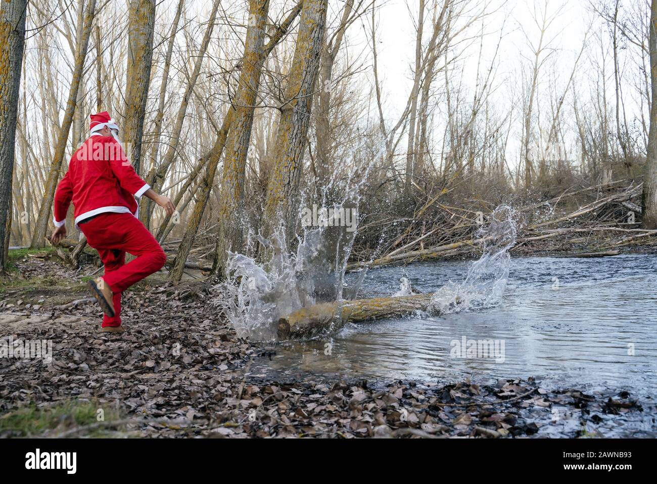 Santa claus throwing gift hi-res stock photography and images - Alamy