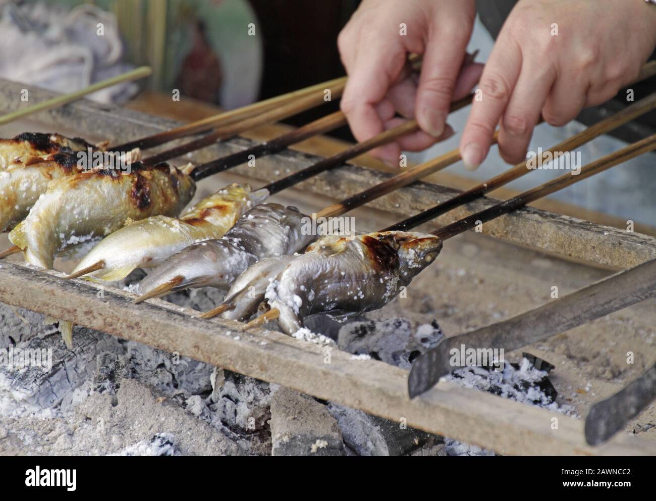 Closeup grilled fish being cooked hi-res stock photography and images ...