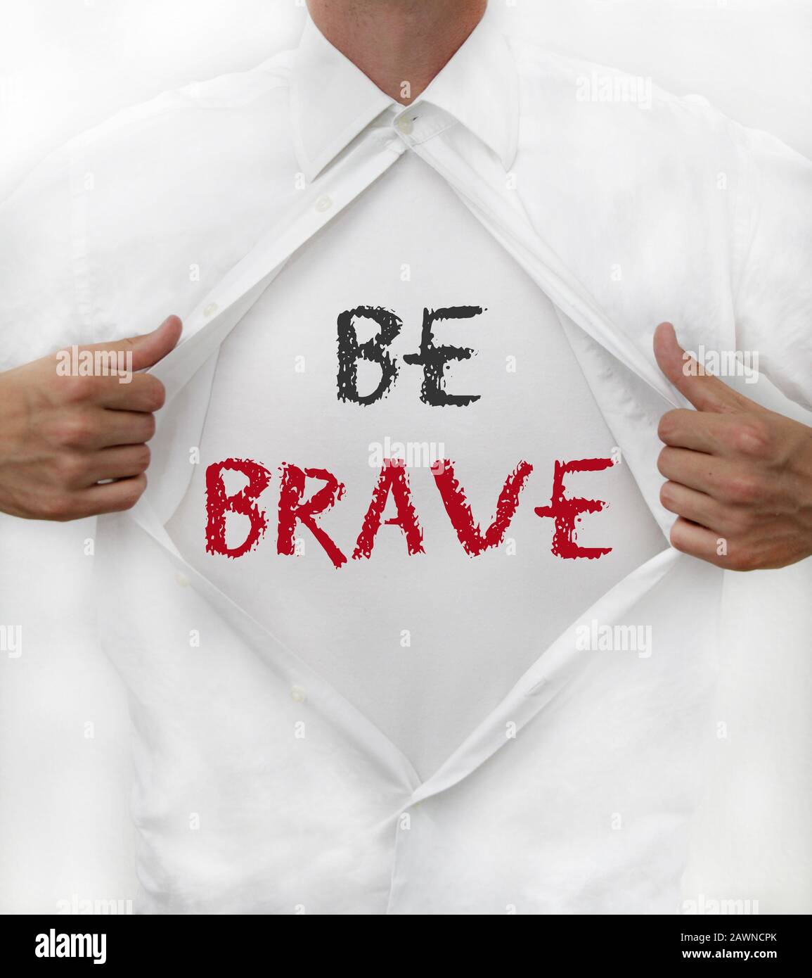 Person ripping his shirt off with a be brave quote printed on his t ...