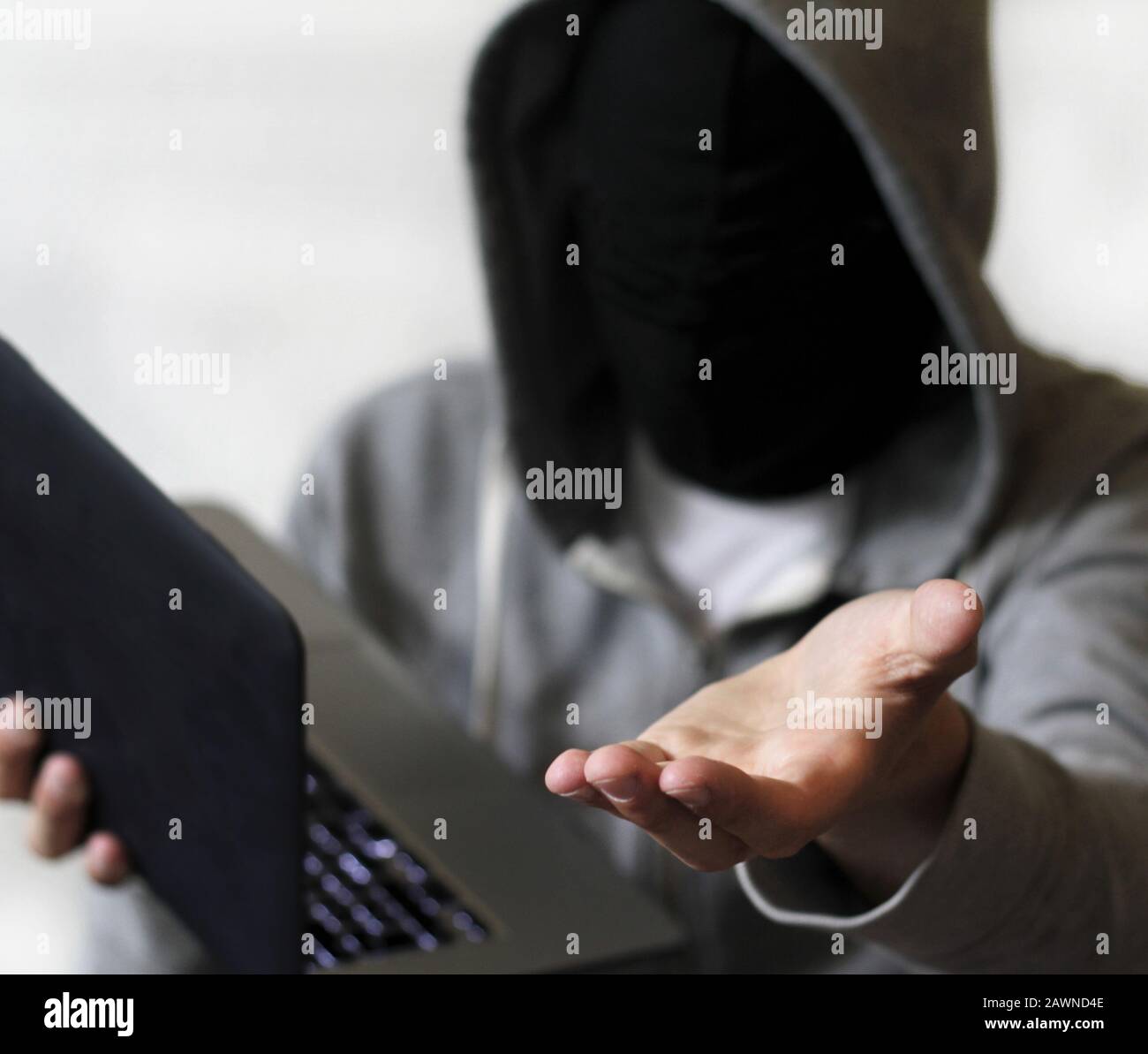 Wide angle shot of a man having no face with his hand in the air Stock ...