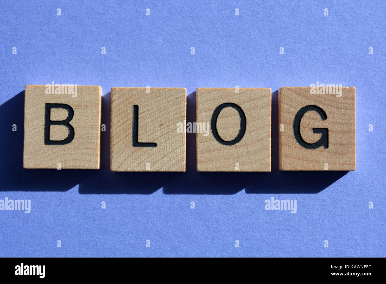Blog, word in 3d wood alphabet letters on purple background Stock Photo ...