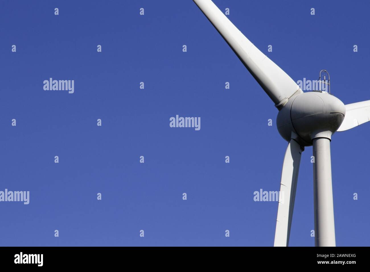 White wind fan under a clear blue sky during daytime Stock Photo - Alamy