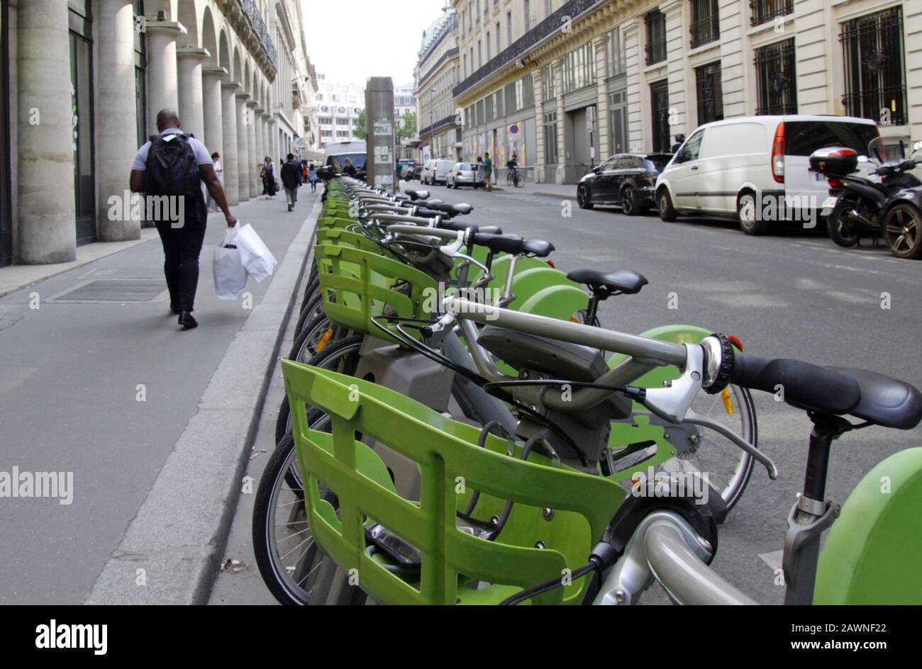 Wide angle shot of green bicycles next to each other on the road Stock ...