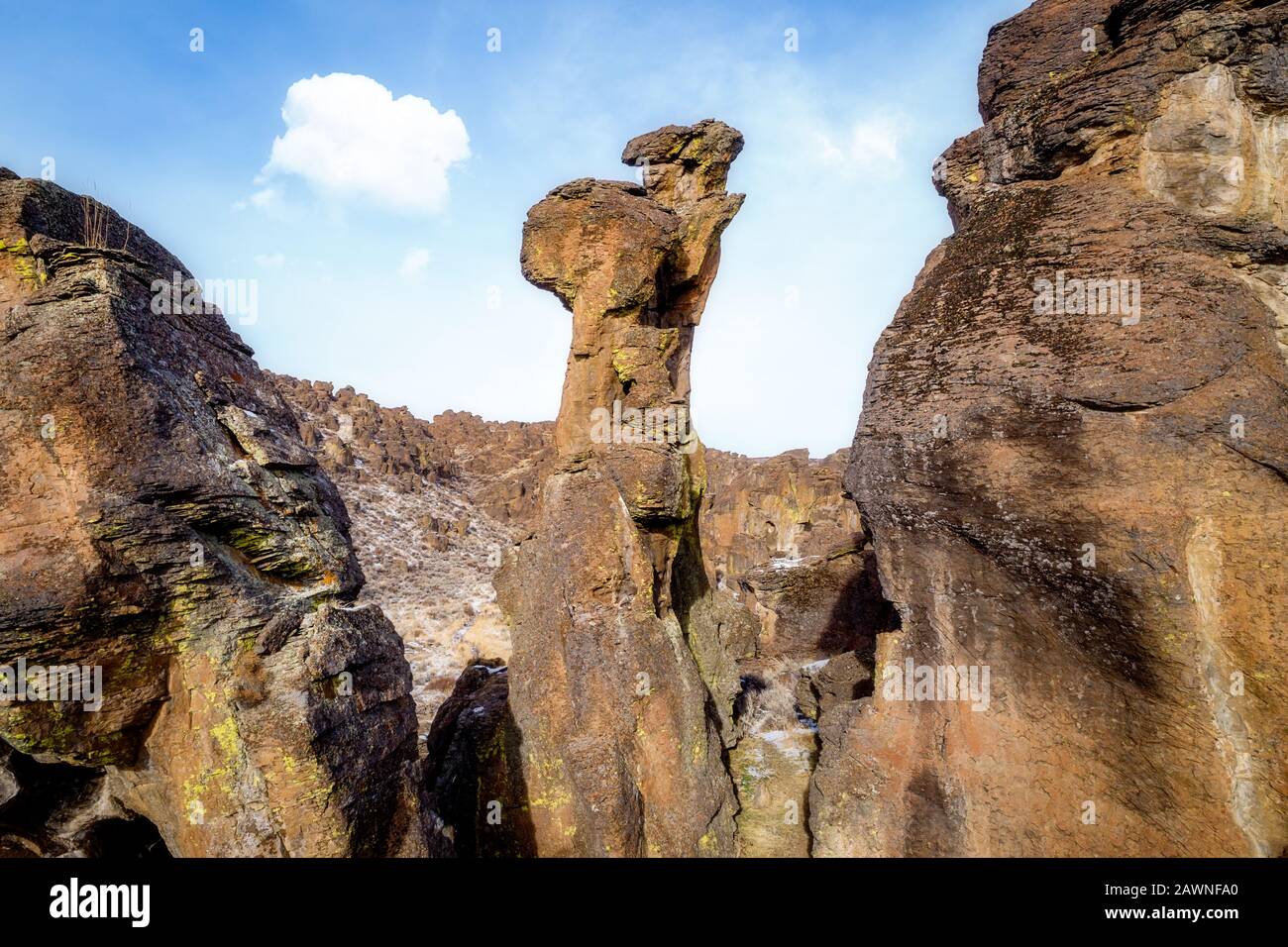 Unique rock panicle in nature with blue sky and clouds Stock Photo - Alamy