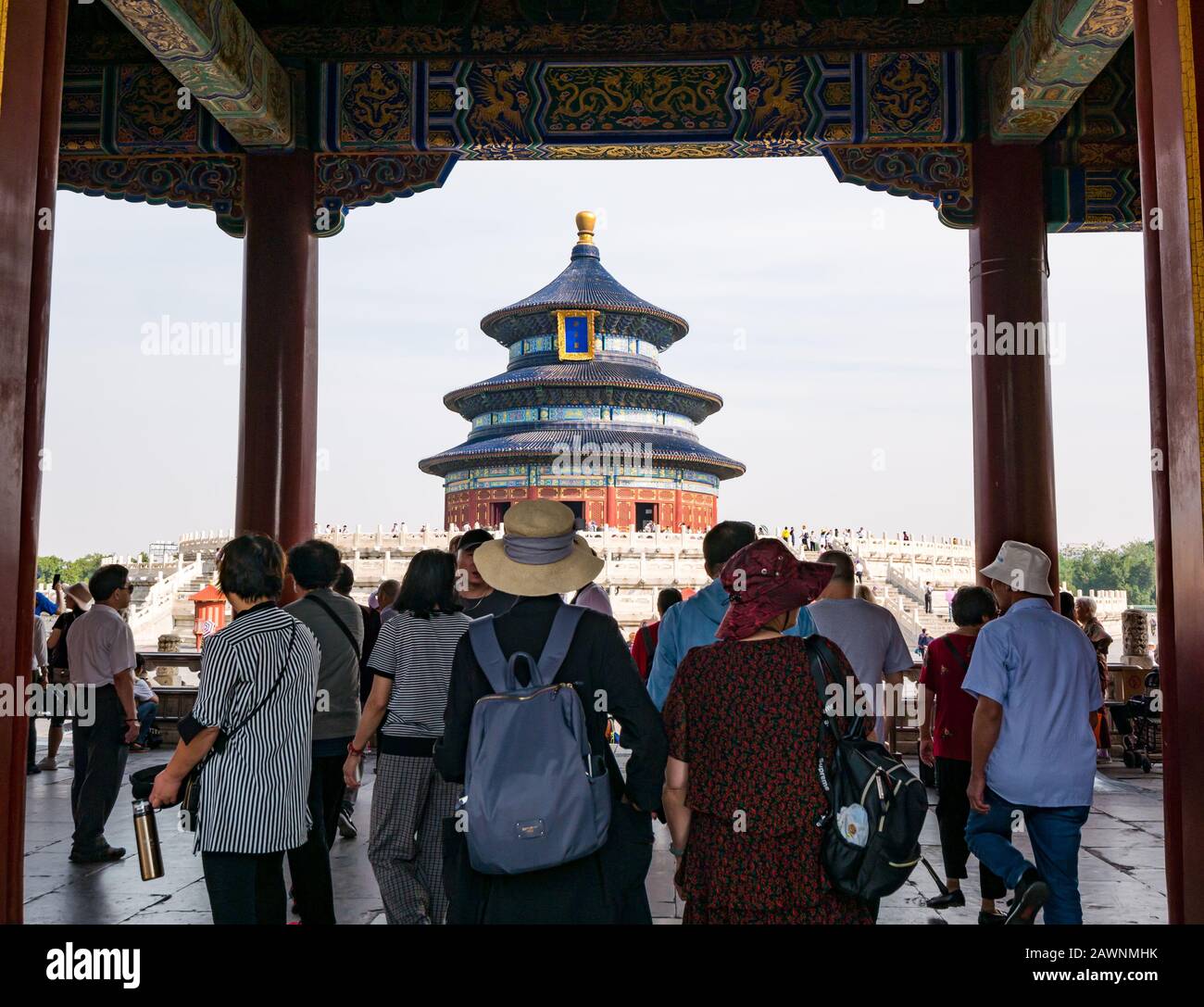 Tourists at gateway entrance of Hall of Prayer for Good Harvests ...