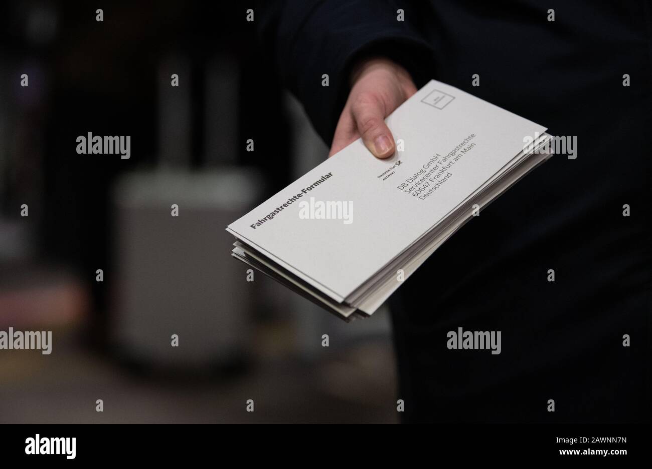 Stuttgart, Germany. 09th Feb, 2020. A railway employee has passenger ...