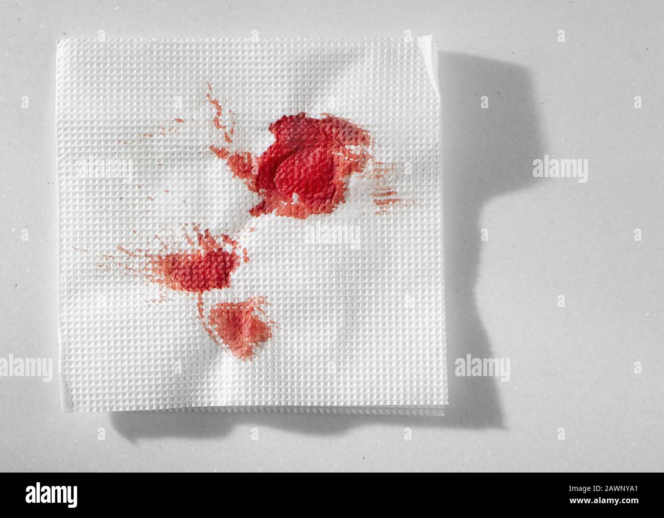 Kitchen paper napkin in the blood. Stopping blood by improvised means ...