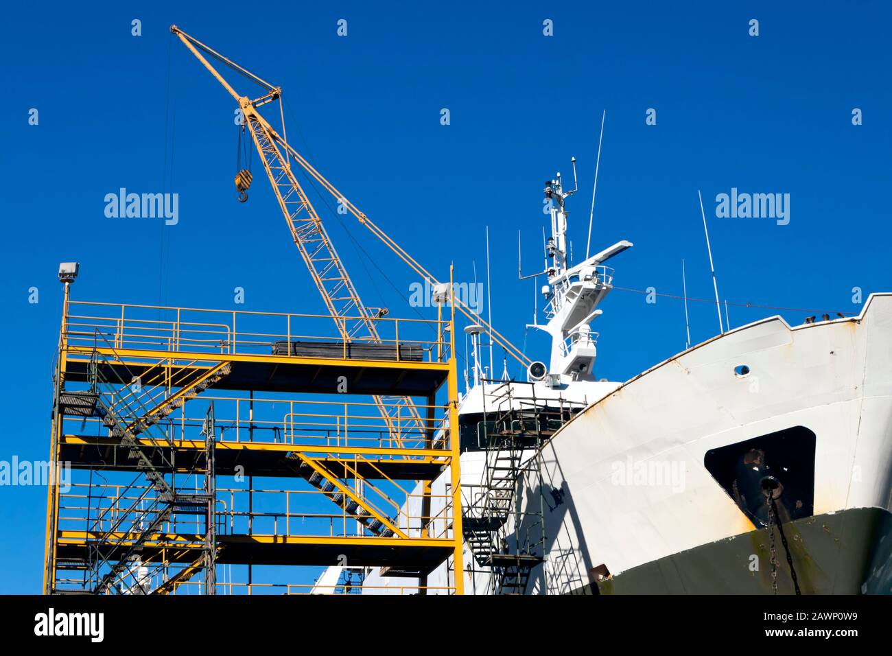 Ship in the shipyard for maintenance and repair work with scaffolds and ...