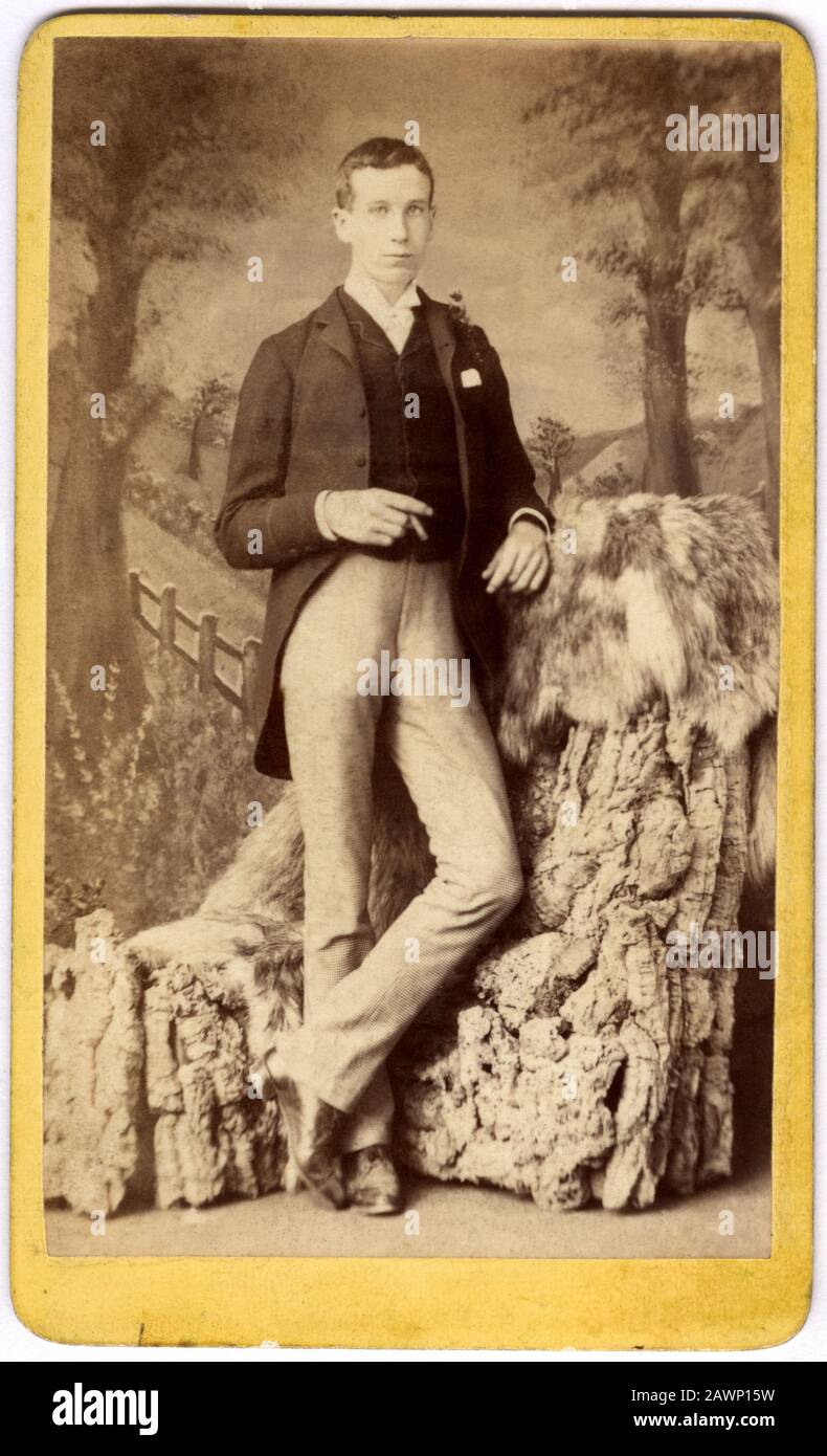 1885 ca , LONDON , GREAT BRITAIN : A young handsome man smoking a cigar ...