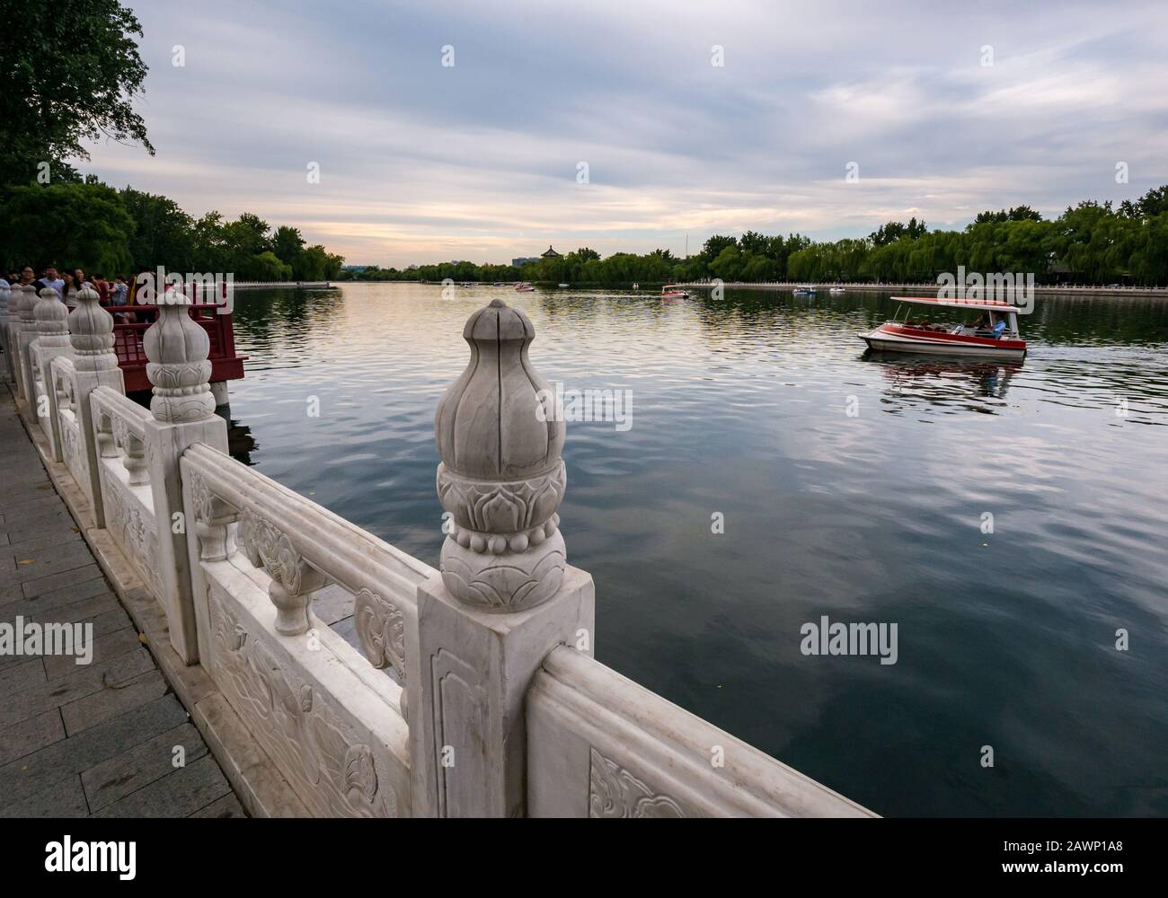 Pedal boat on Houhai Imperial Lake at sunset, Xi Cheng Hutong District ...