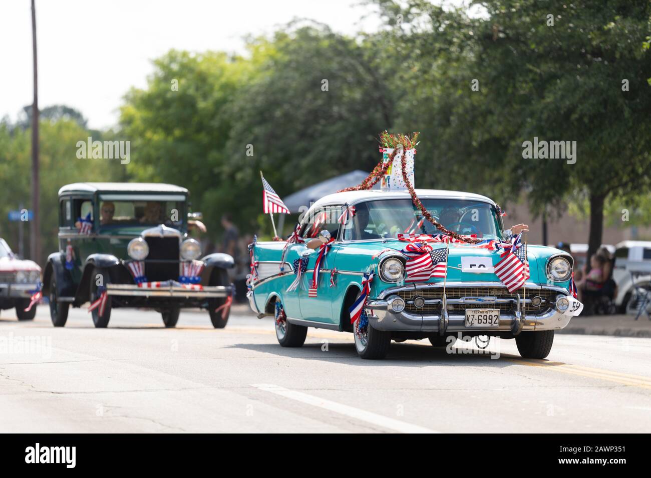 4th july parade flags cars hi-res stock photography and images - Alamy