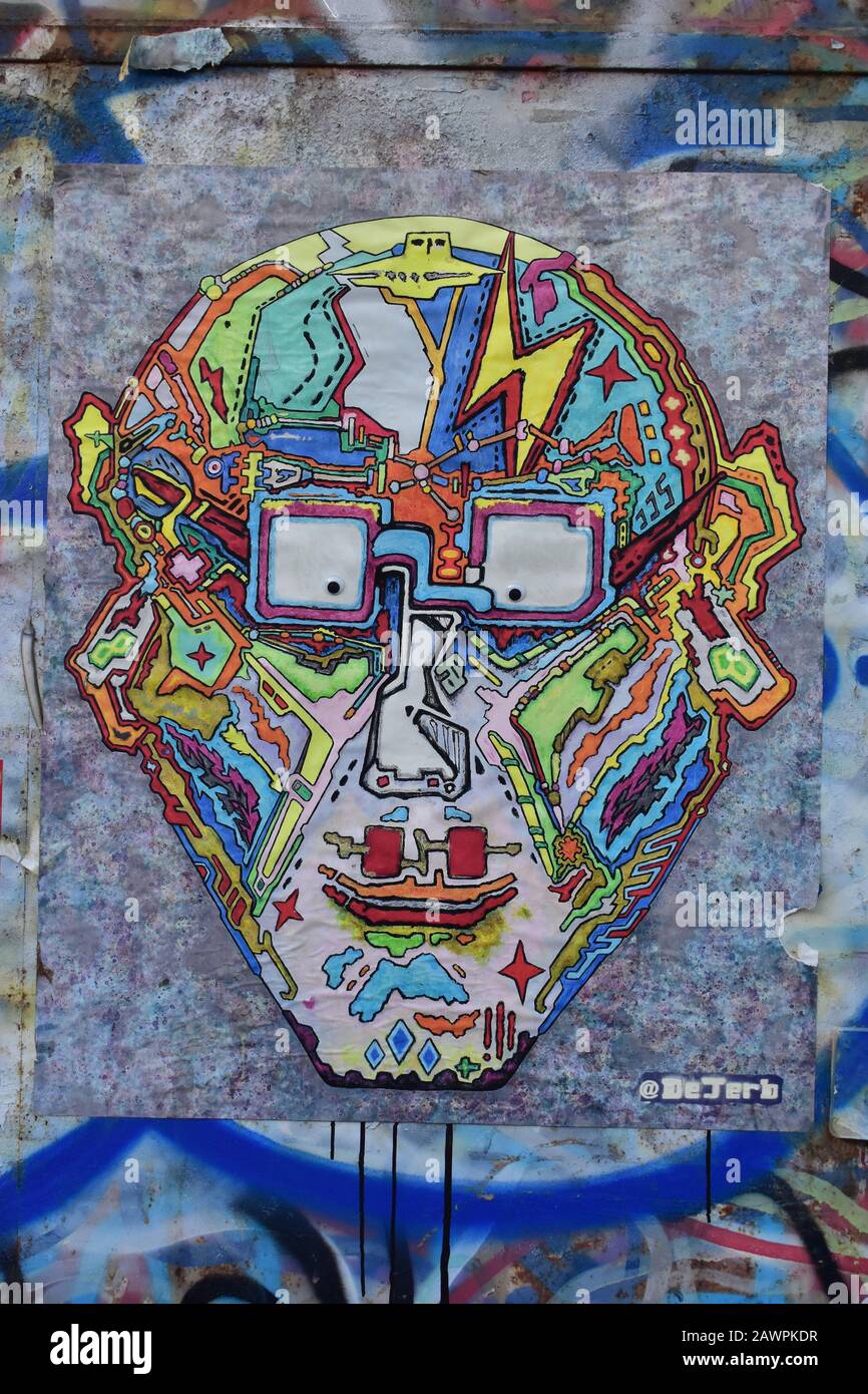 multi colored face Graffiti on a wall in Florentin Tel Aviv Stock Photo ...