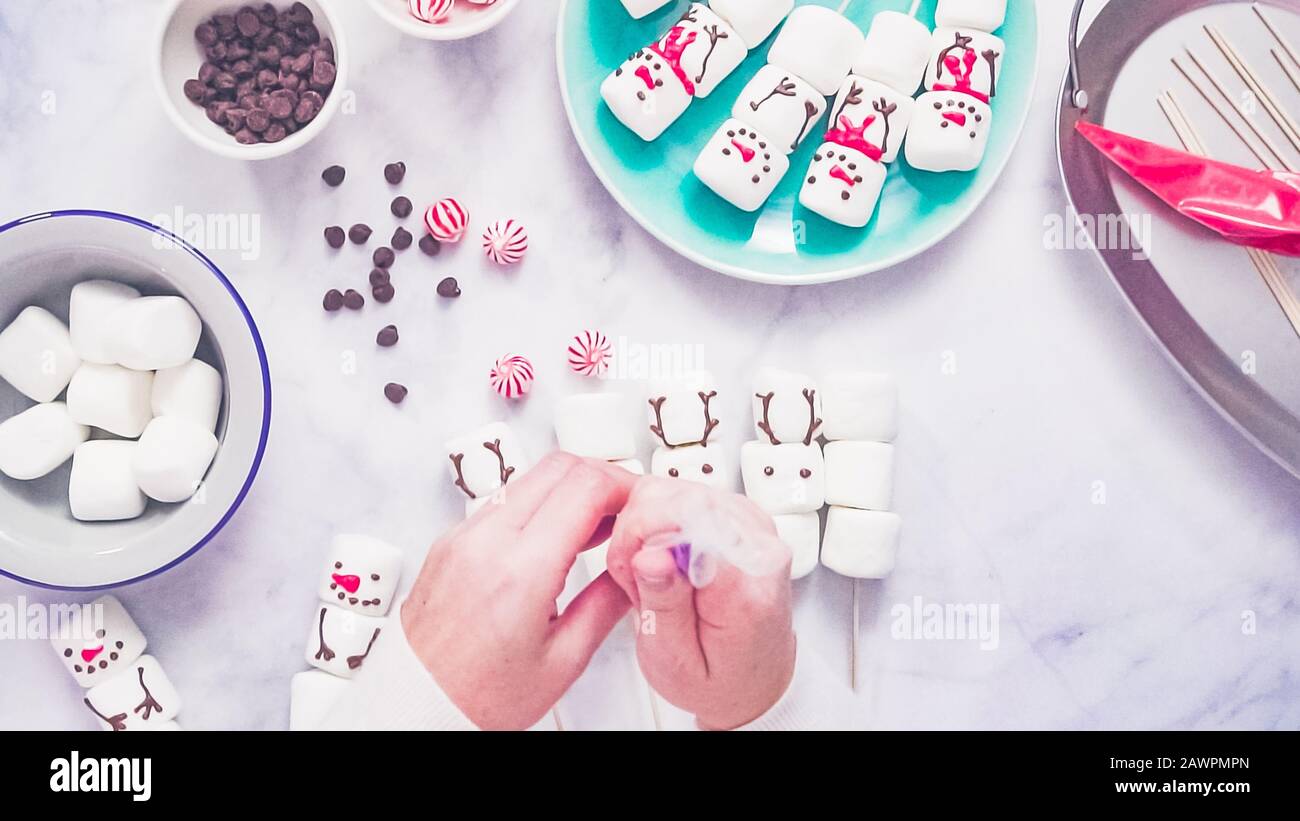 Step by step. Flat lay. Making marshmallow snowman and reindeer on ...