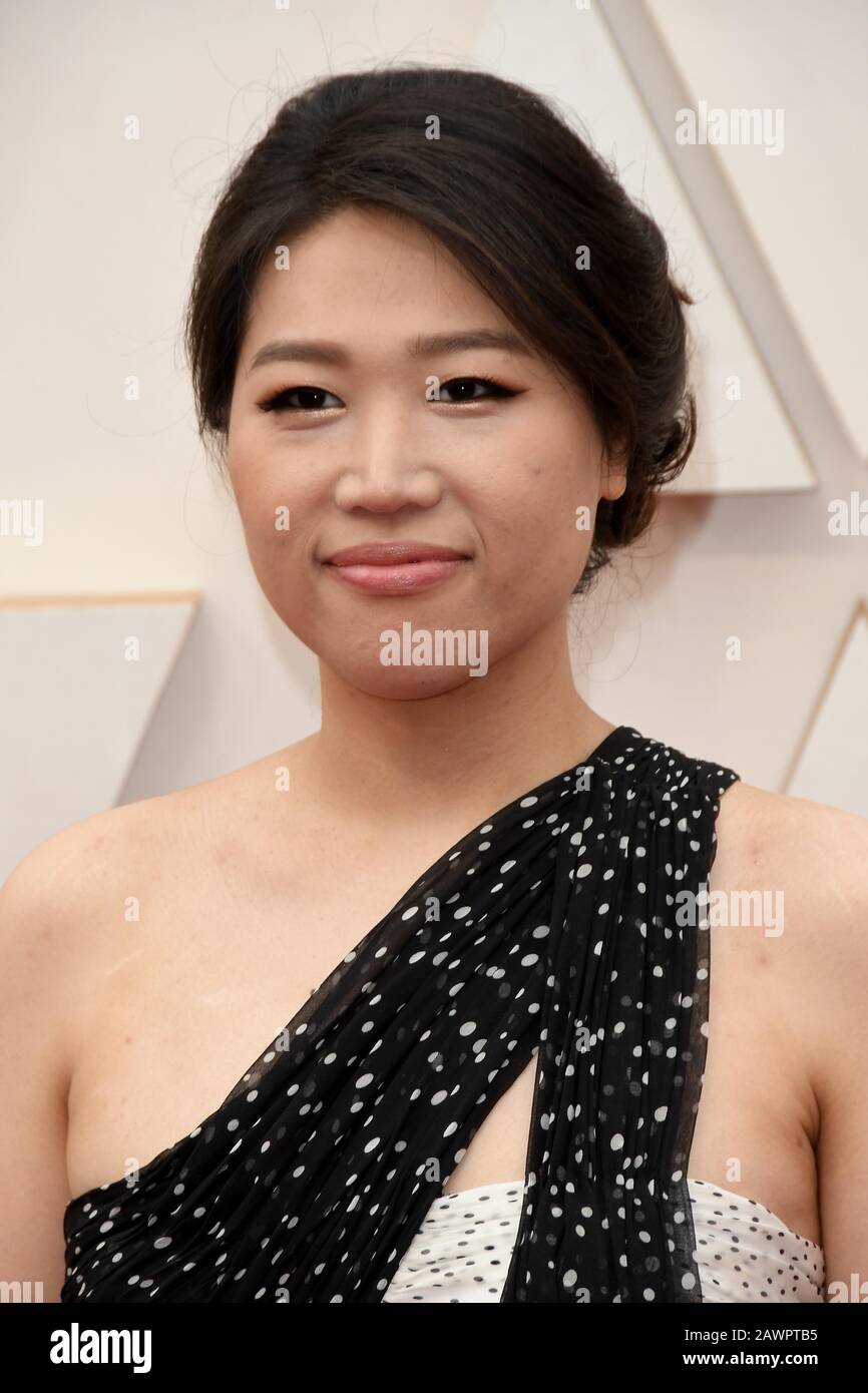 Siqi Song walking on the red carpet at the 92nd Annual Academy Awards ...