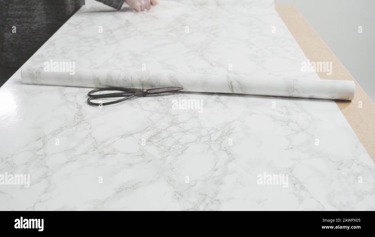 Making marble board with adhesive paper for food photography Stock ...