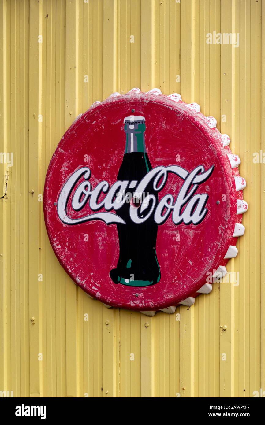 A vintage Coca-Cola sign on a wall Stock Photo - Alamy