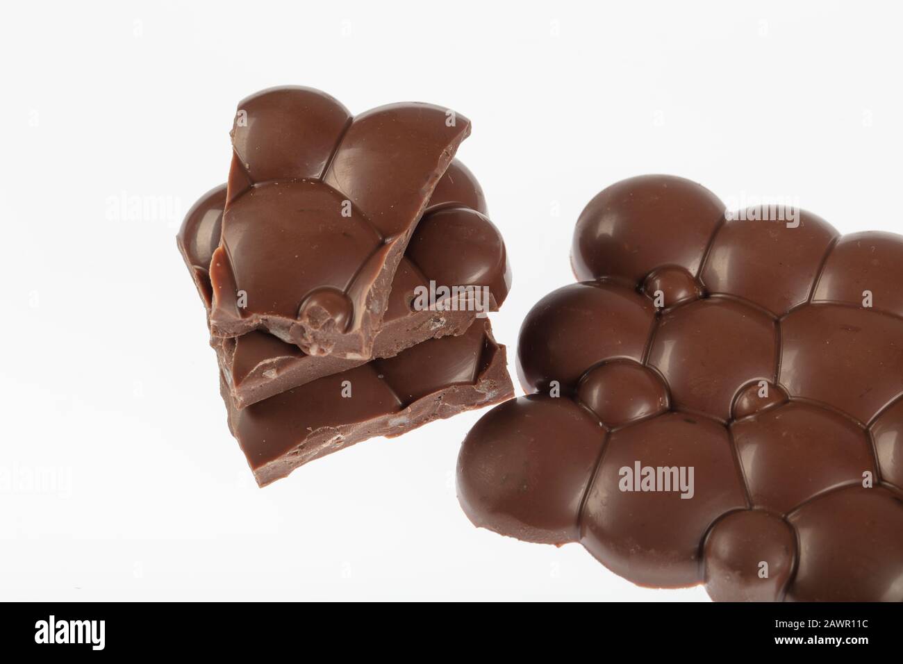 milk chocolate bar, chocolate popping (popcik) isolated on white ...