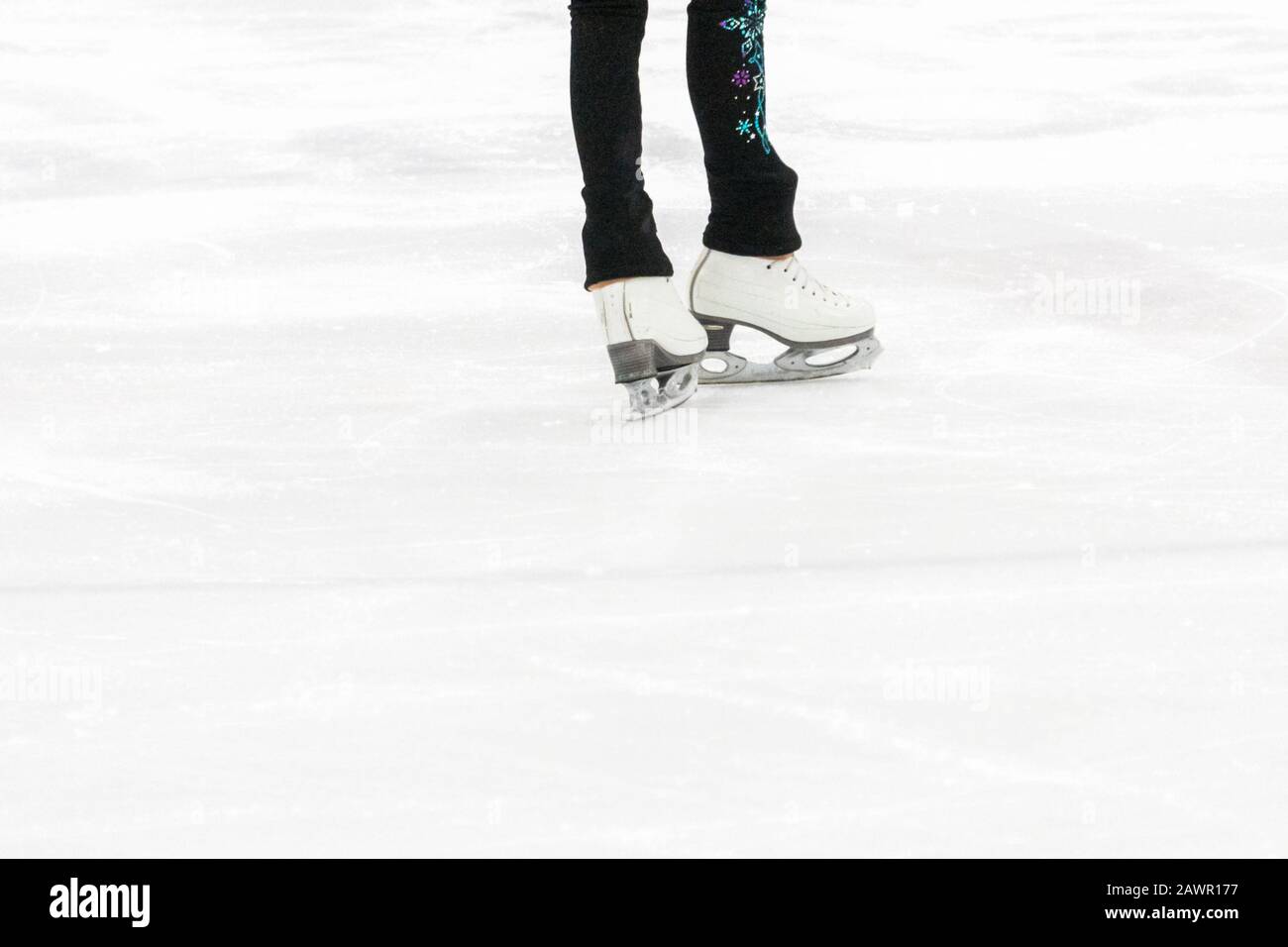 View of figure skater feet at the figure skating practice Stock Photo ...
