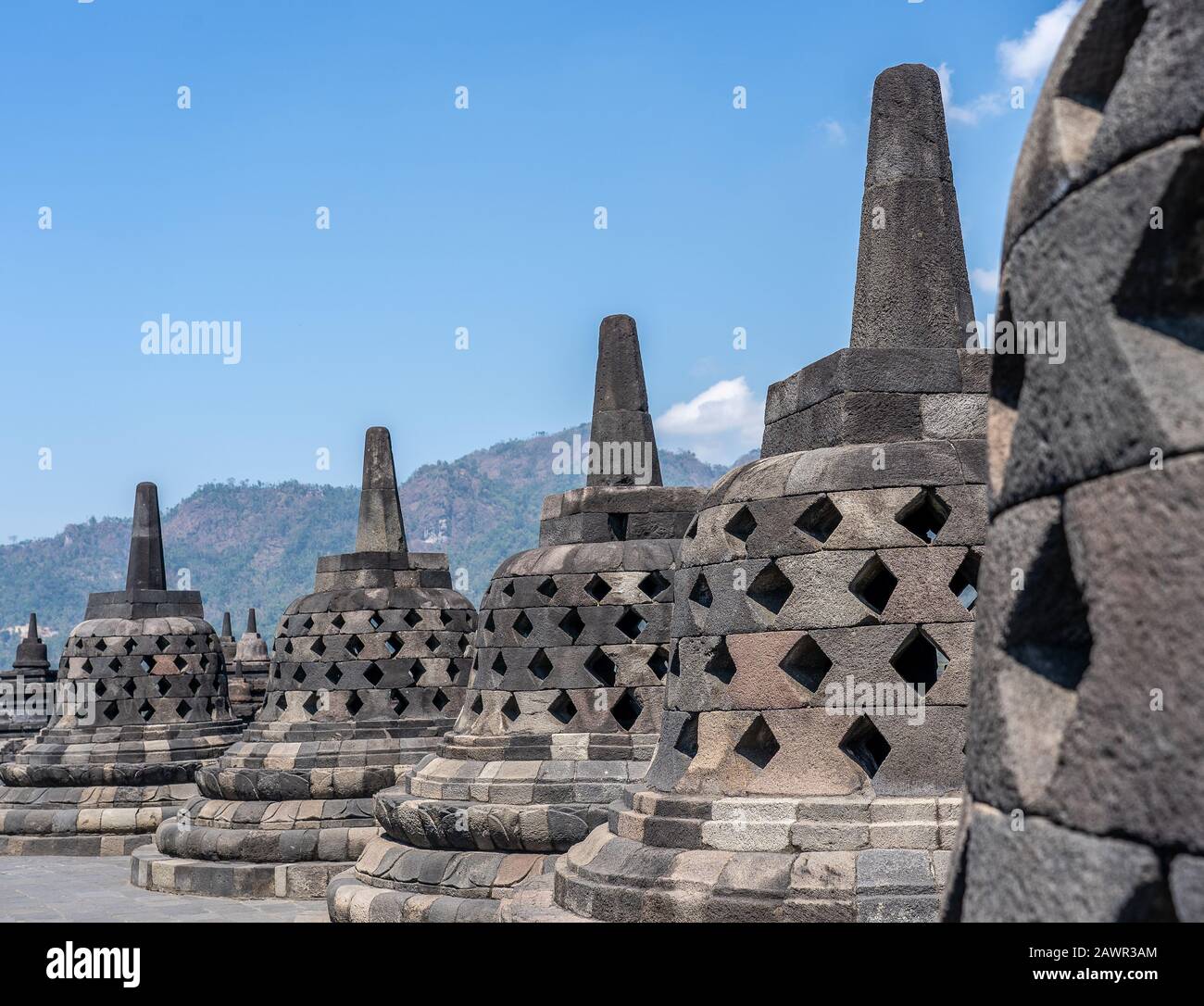 Stone bell sculptures of the Borobudur Temple, Mungkid, Indonesia Stock ...