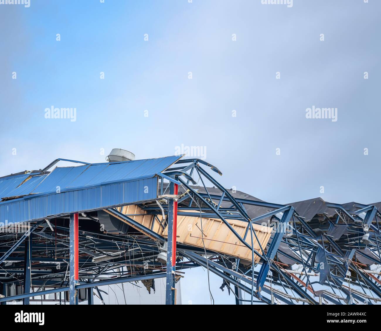 Wide shot of a destroyed metal structure with a blue sky Stock Photo ...